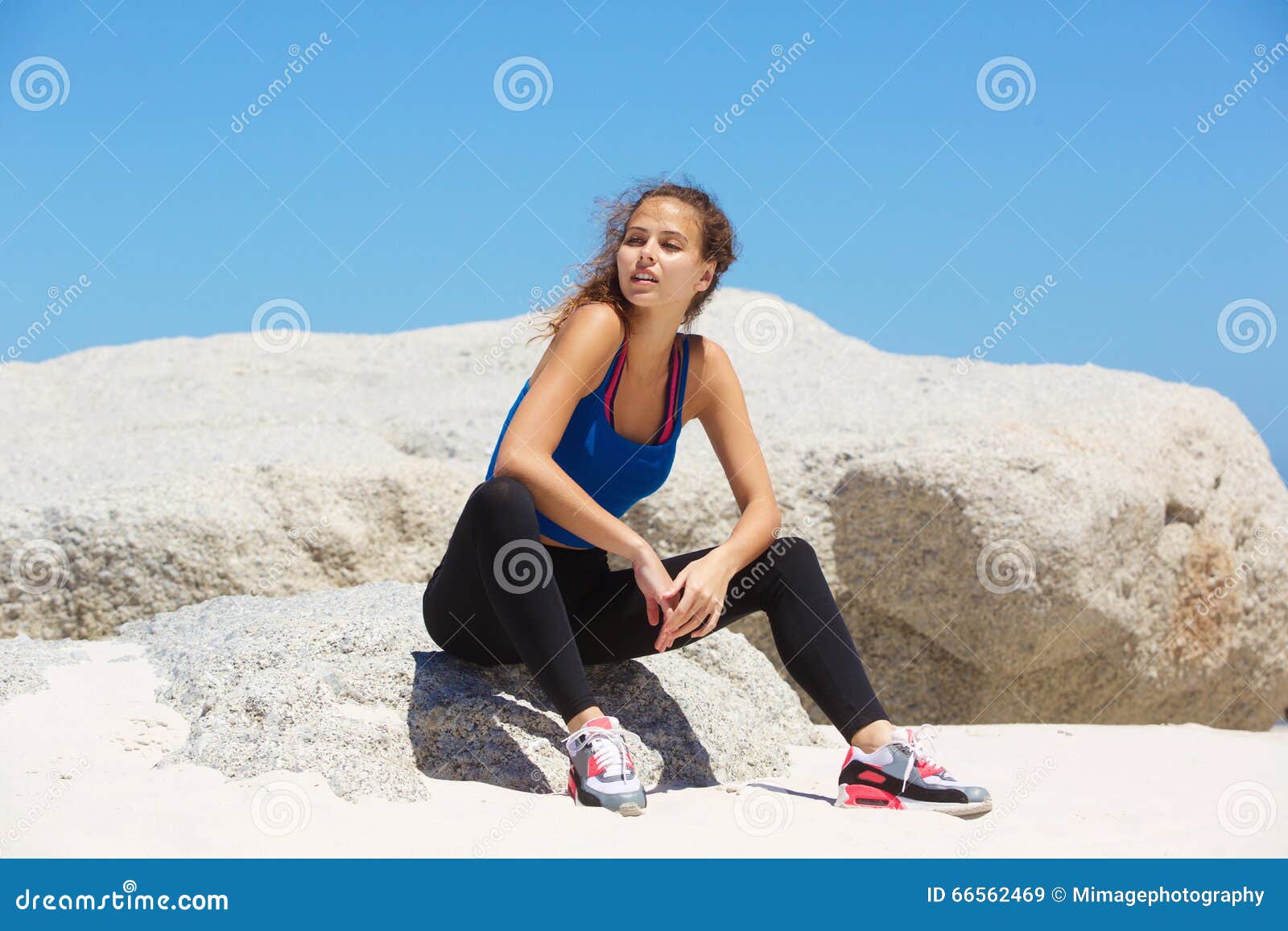 Female Runner Relaxing at the Beach Stock Image - Image of relaxation ...