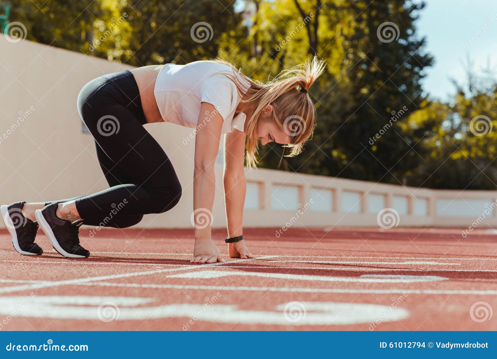 Female Runner in Start Position Stock Photo - Image of body, action ...