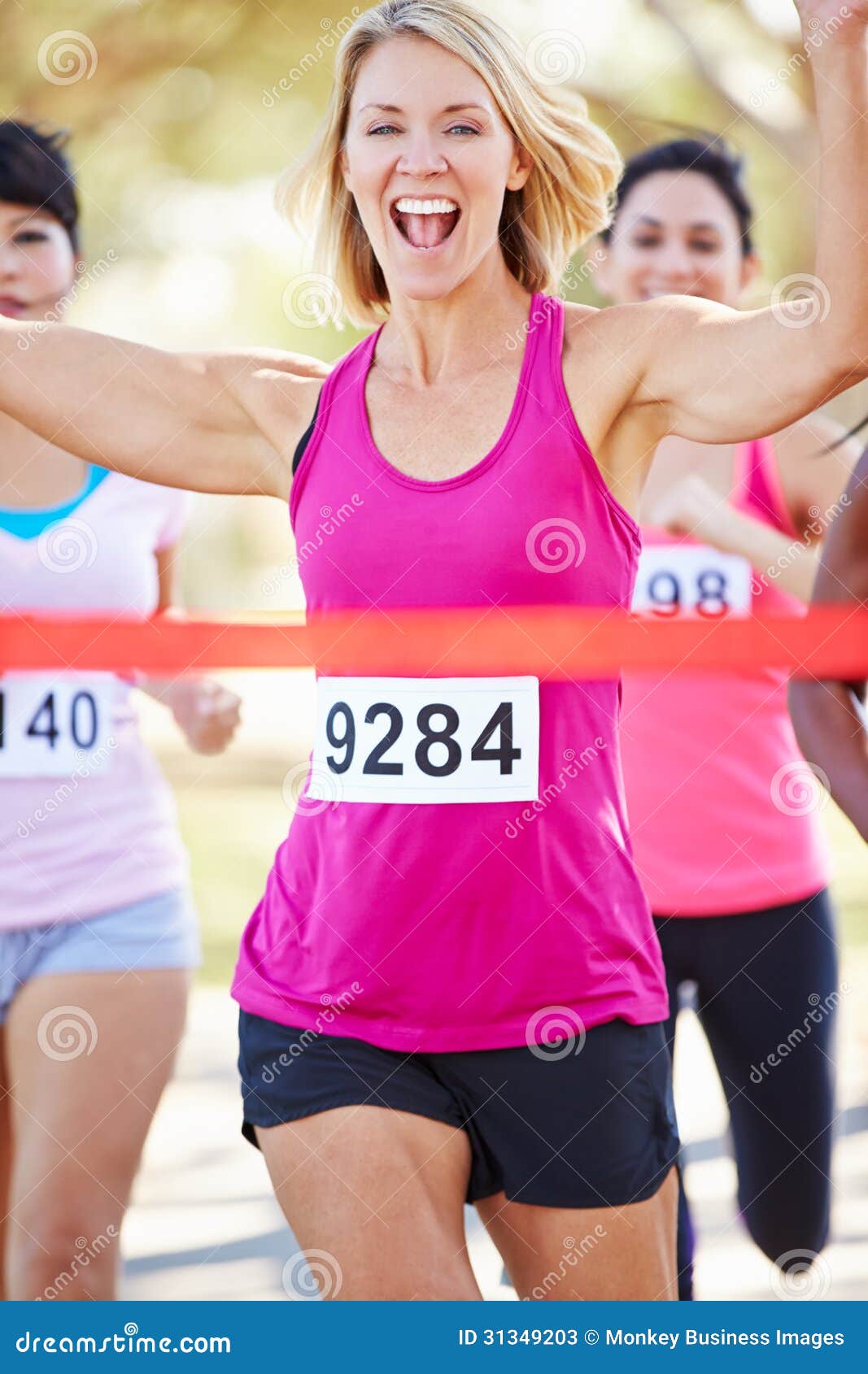 Female Runner Winning Marathon Stock Image - Image of competitor, race ...