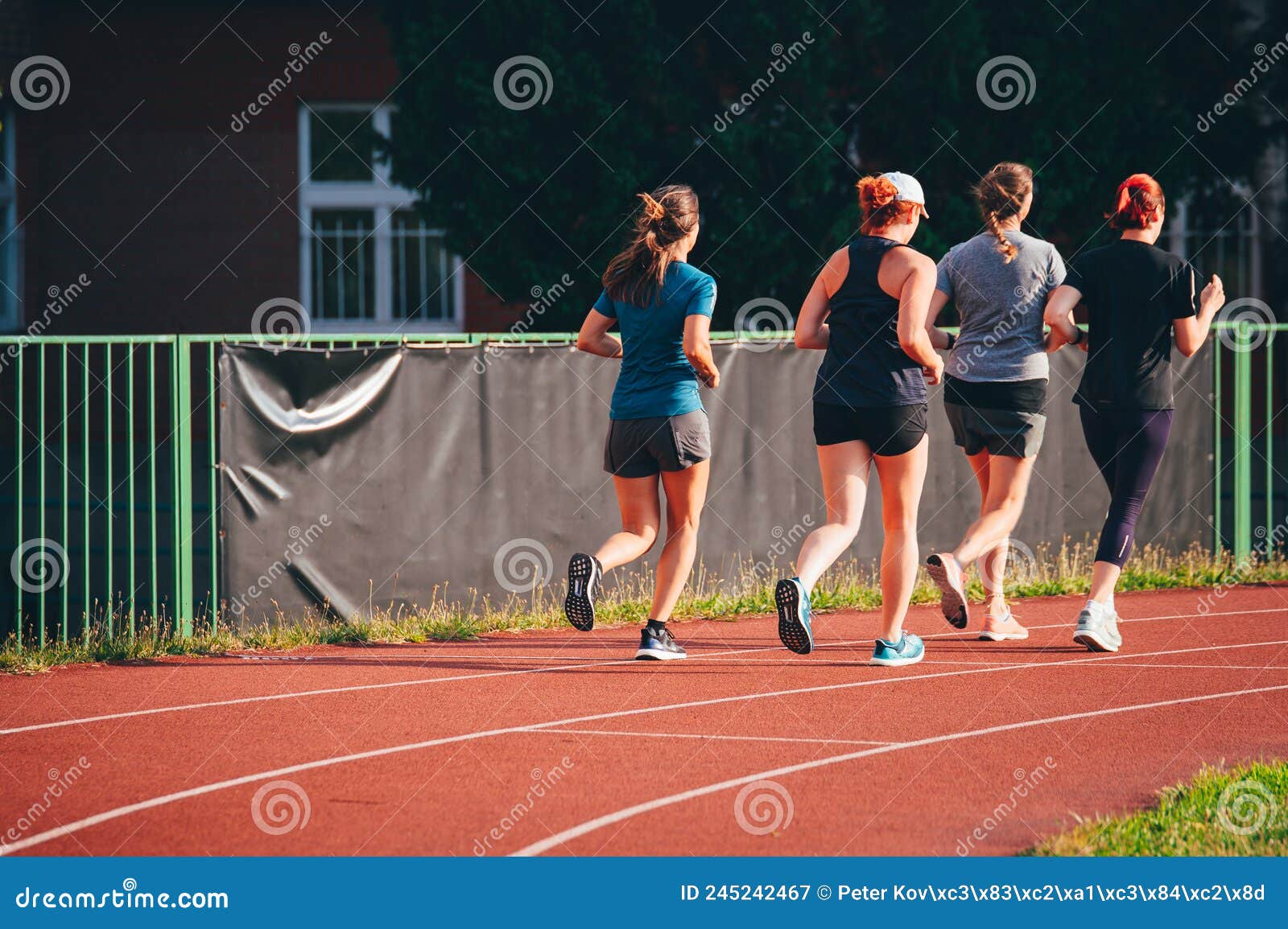 Female Running Training in Group. Sport Photo, Teamwork and Motivation ...
