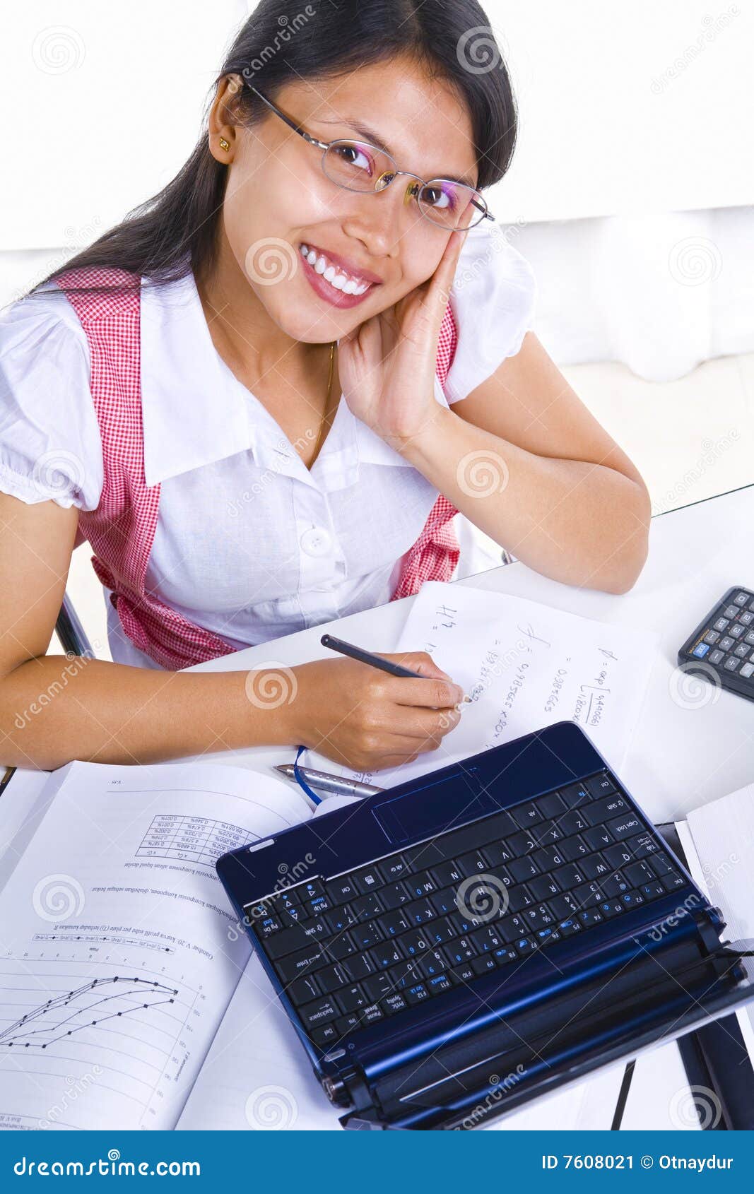 Female Scholar Looking at Camera while Studying Stock Image - Image of ...