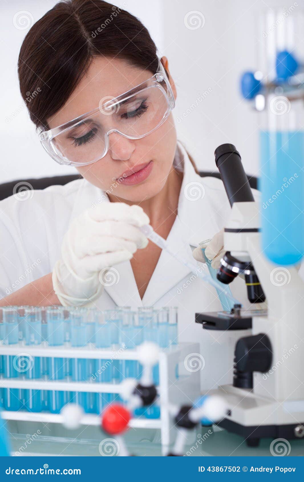 Female Scientist Analyzing Sample Stock Photo - Image of drop ...