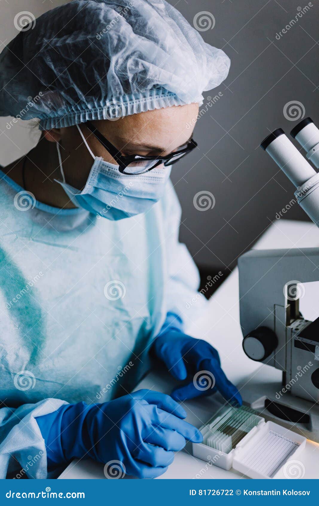 Female Scientist Arranging Microscope Glasses in Box Stock Photo ...