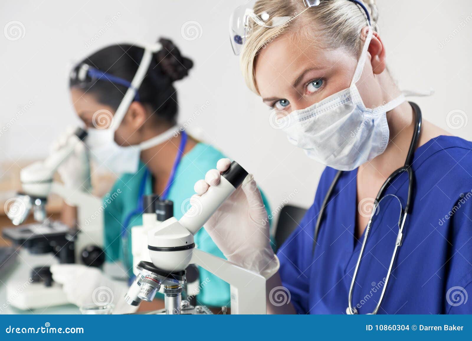 Female Scientist or Doctor Using Microscope Stock Photo - Image of ...