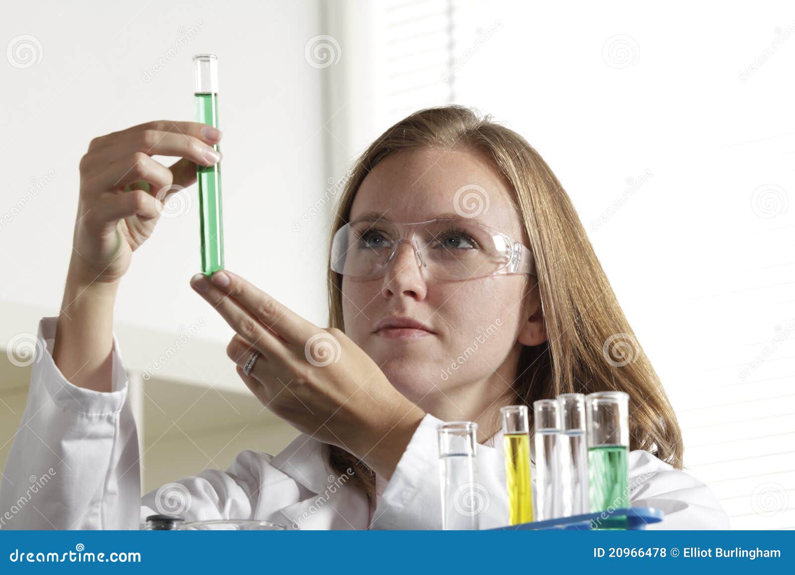 Female Scientist in the Lab with Test Tube Stock Photo - Image of ...