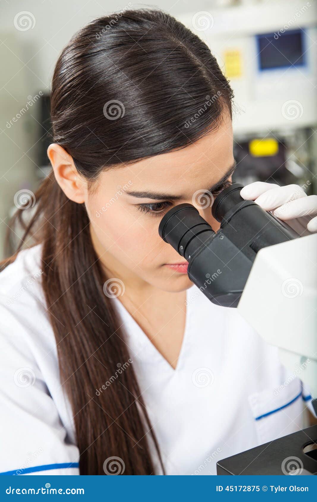 Female Scientist Looking through Microscope Stock Image - Image of ...