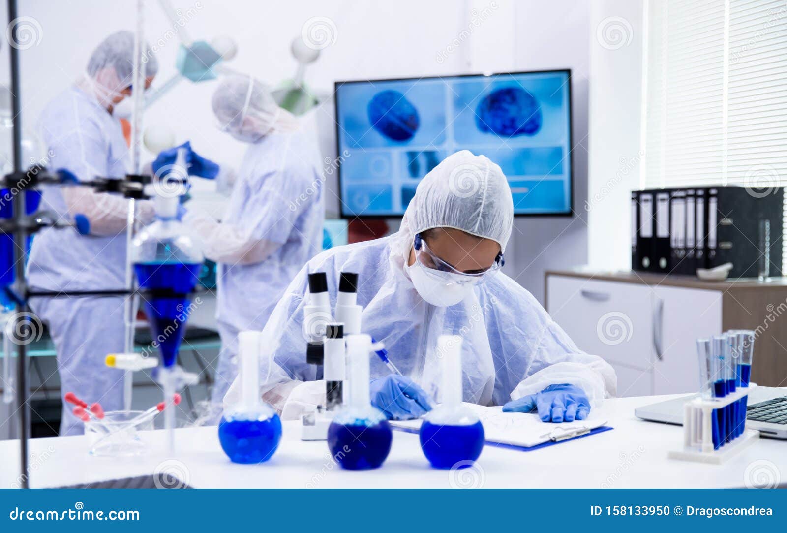 Female Scientist with Microscope Near and Smoking Blue Solution Stock ...