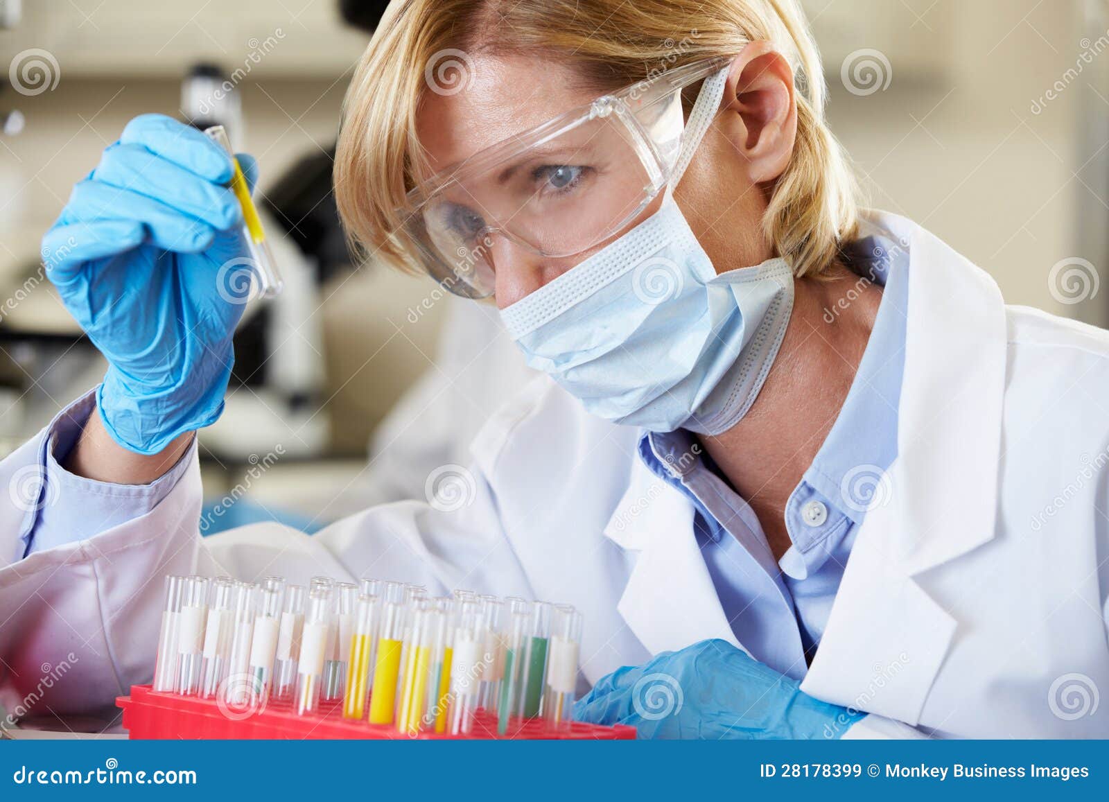 Female Scientist Studying Test Tube in Laboratory Stock Image - Image ...