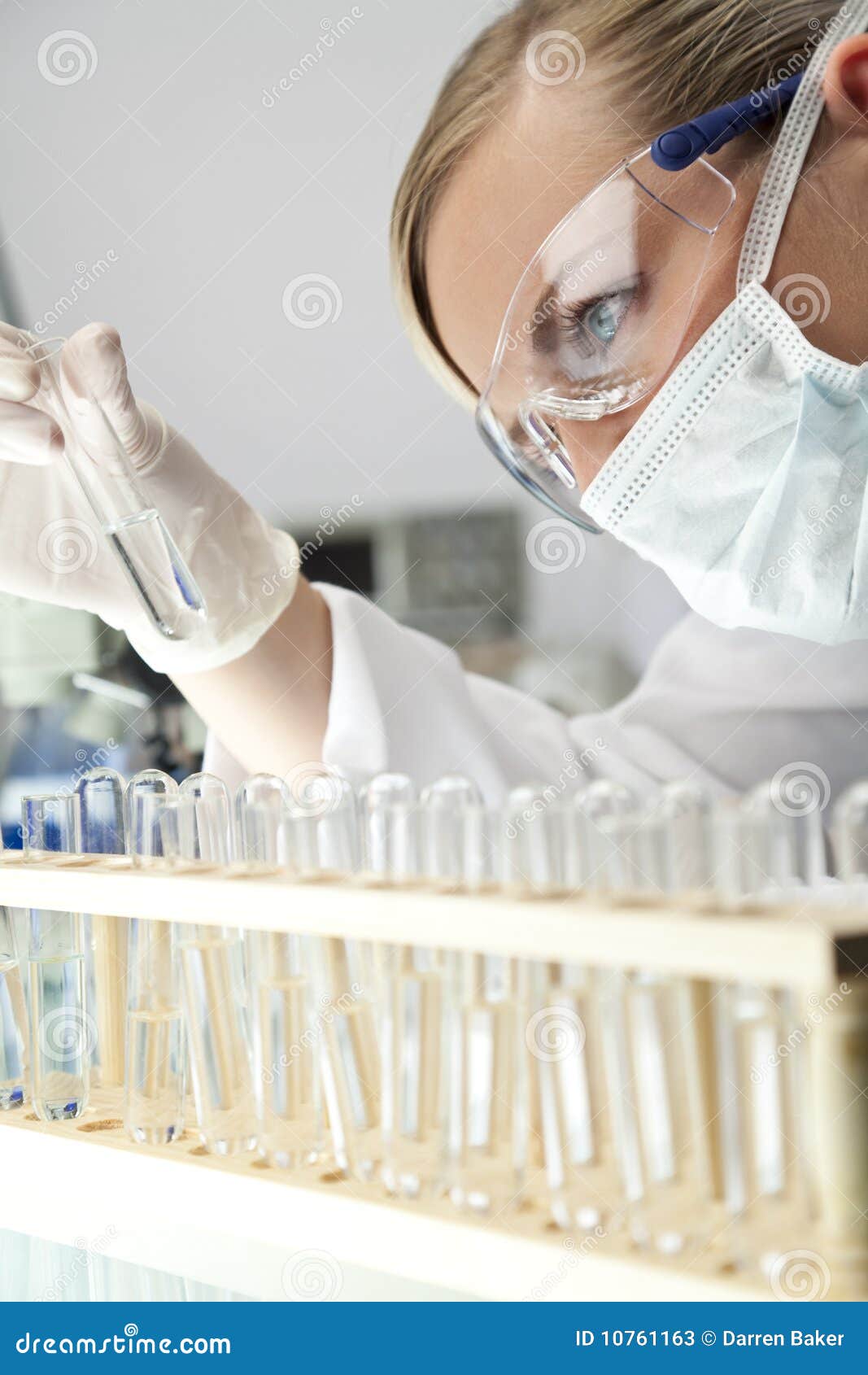 Female Scientist in Surgical Mask in Laboratory Stock Image - Image of ...