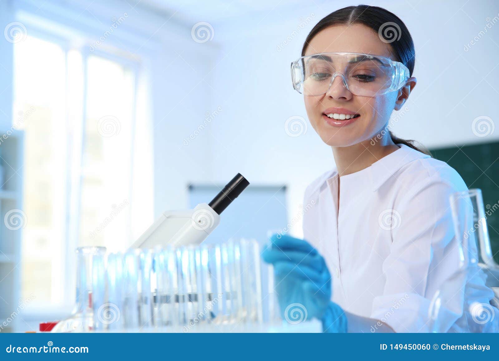 Female Scientist Working in Chemistry Laboratory Stock Photo - Image of ...