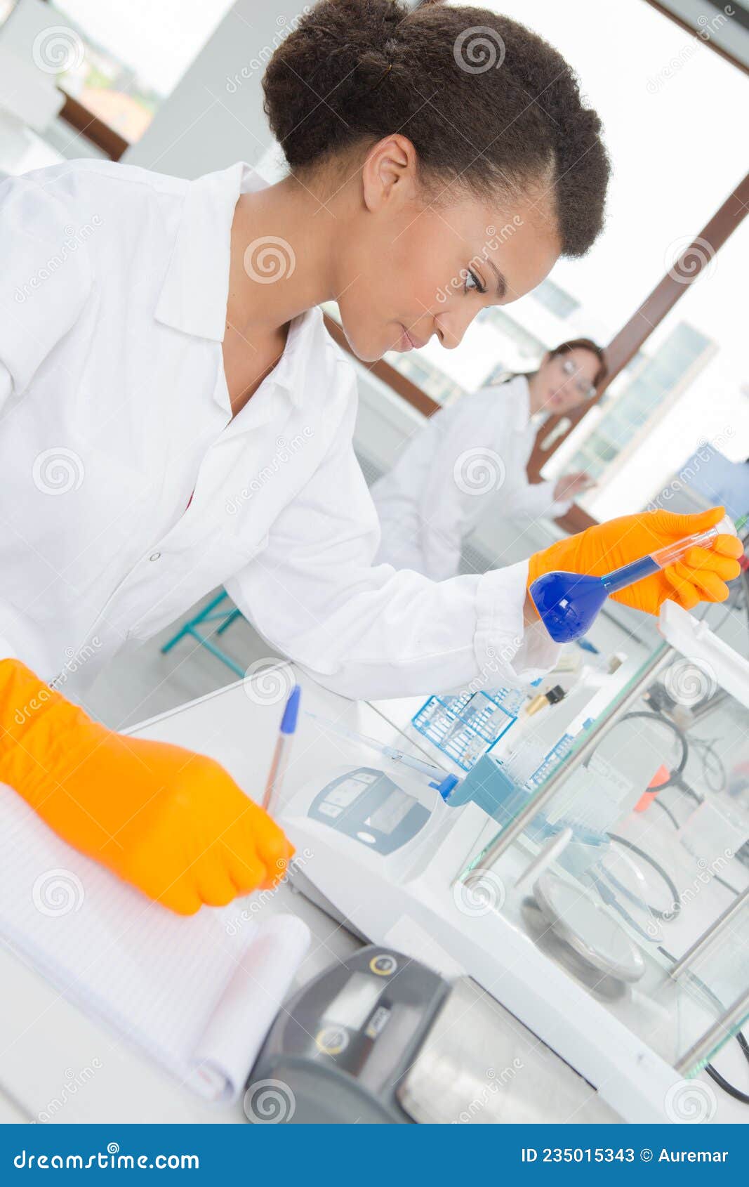 Female Scientist Working in Laboratory Stock Image - Image of focused ...