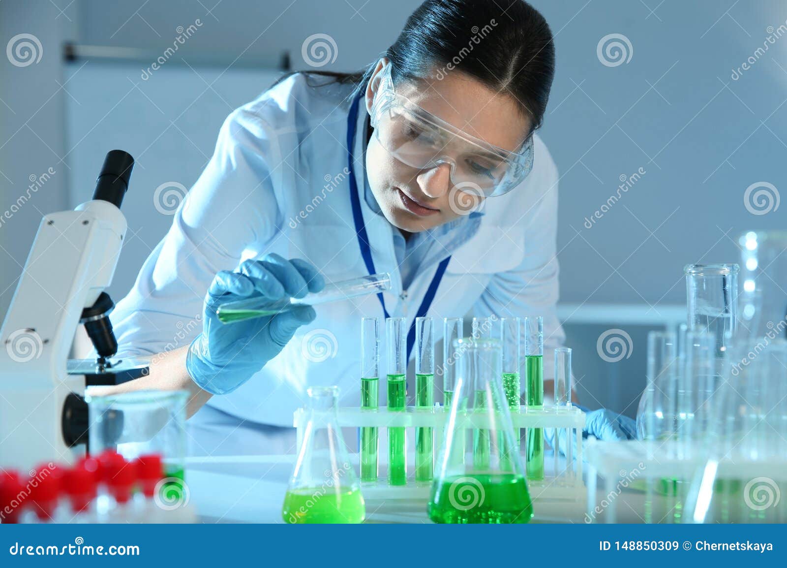 Female Scientist Working with Sample in Chemistry Laboratory Stock ...