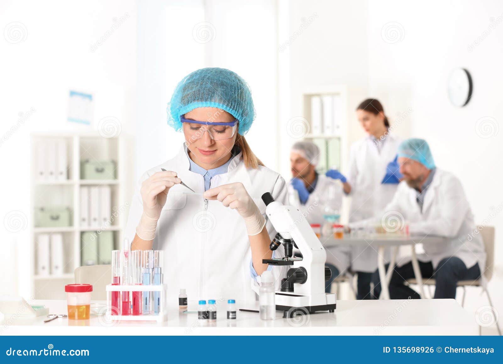 Female Scientist Working at Table in Laboratory, Space for Text Stock ...