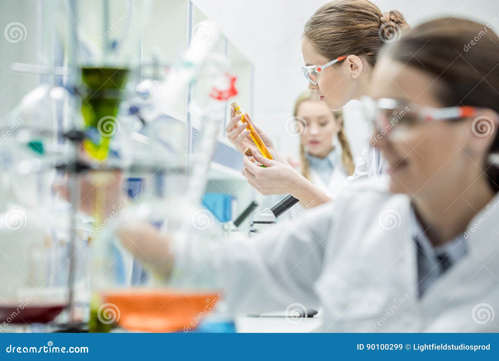 Female scientists in lab stock image. Image of research - 90100299