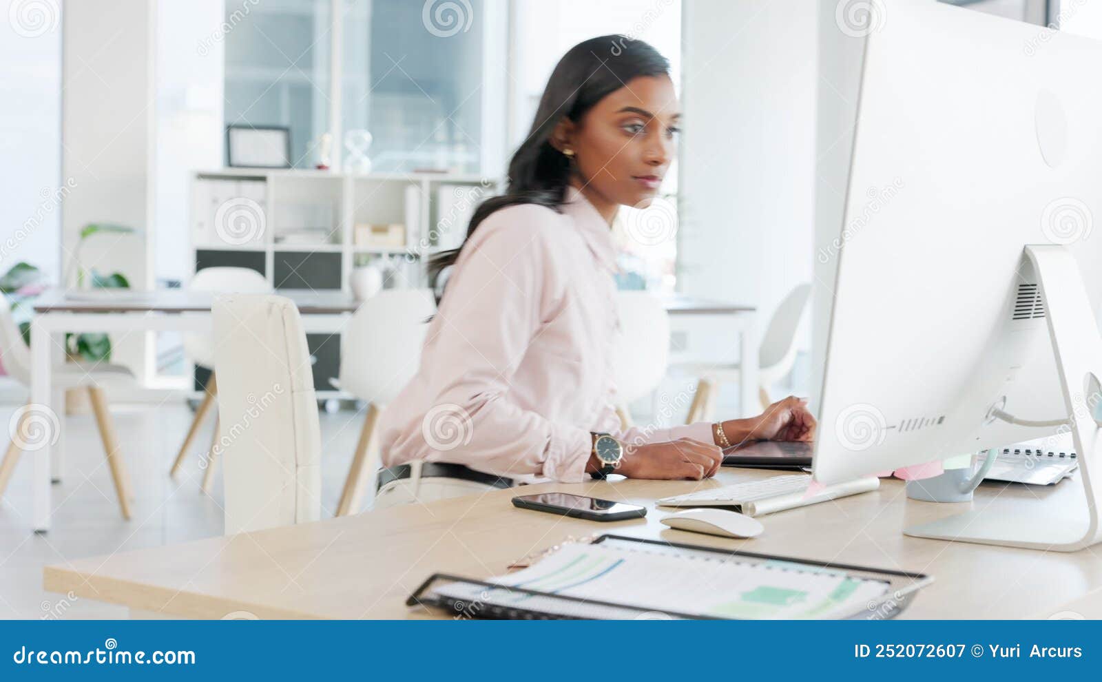 Female Secretary Browsing Online and Typing an Email on a Desktop ...