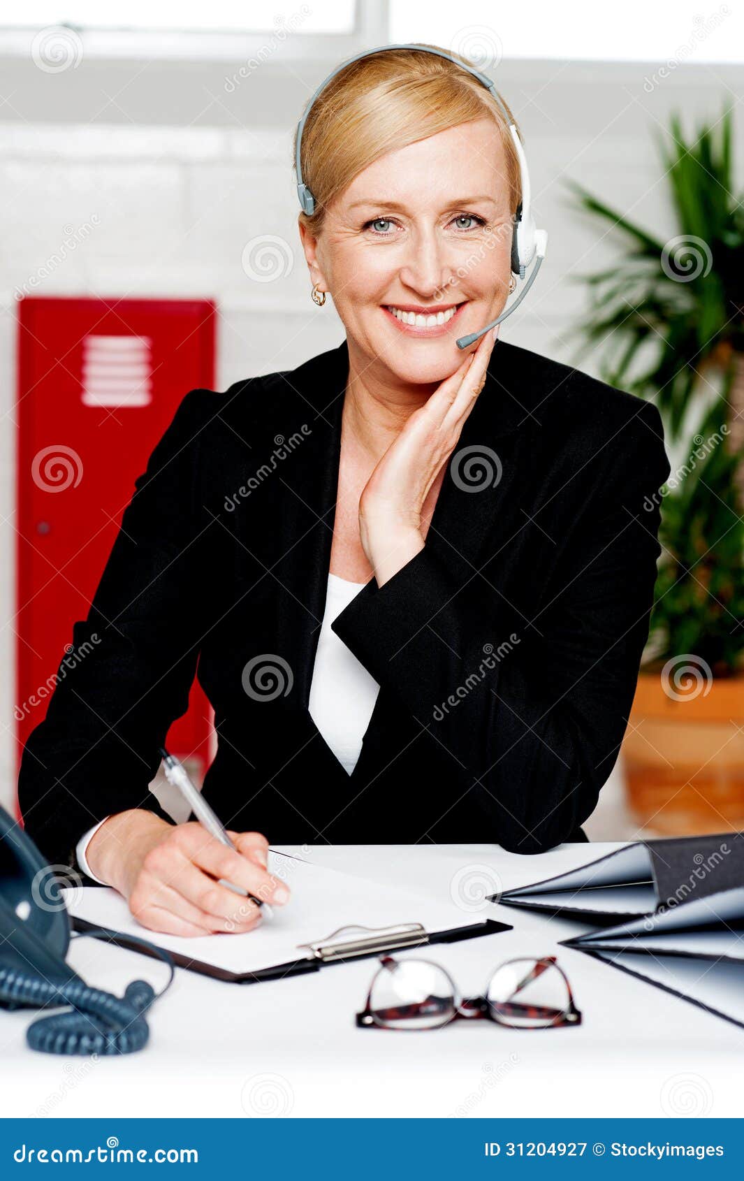 Female Secretary Confirming Appointment Stock Image - Image of ...