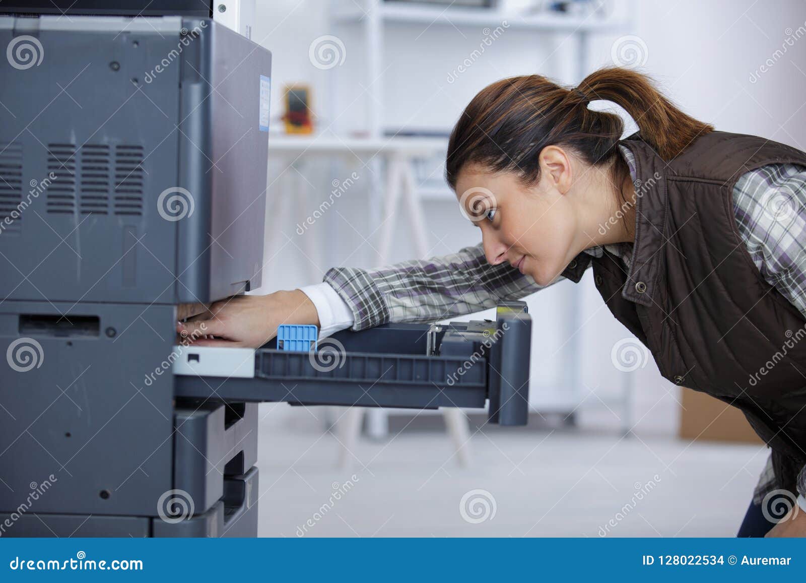 Female Secretary Inserting Paper in Printer at Desk Stock Photo - Image ...