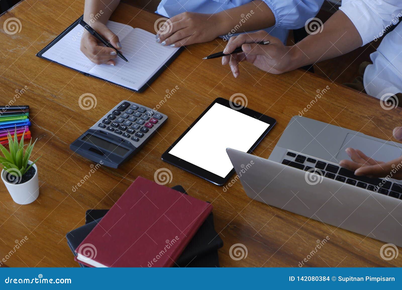 Female Secretary Sitting Next To Boss Taking Down Note in Office ...