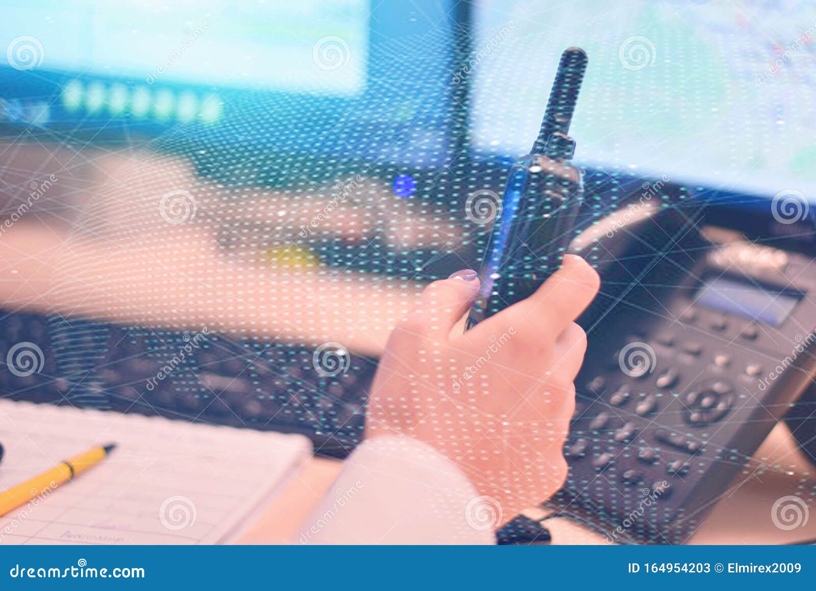 Female Security Guard Operator Talking on the Phone, Calling in the ...