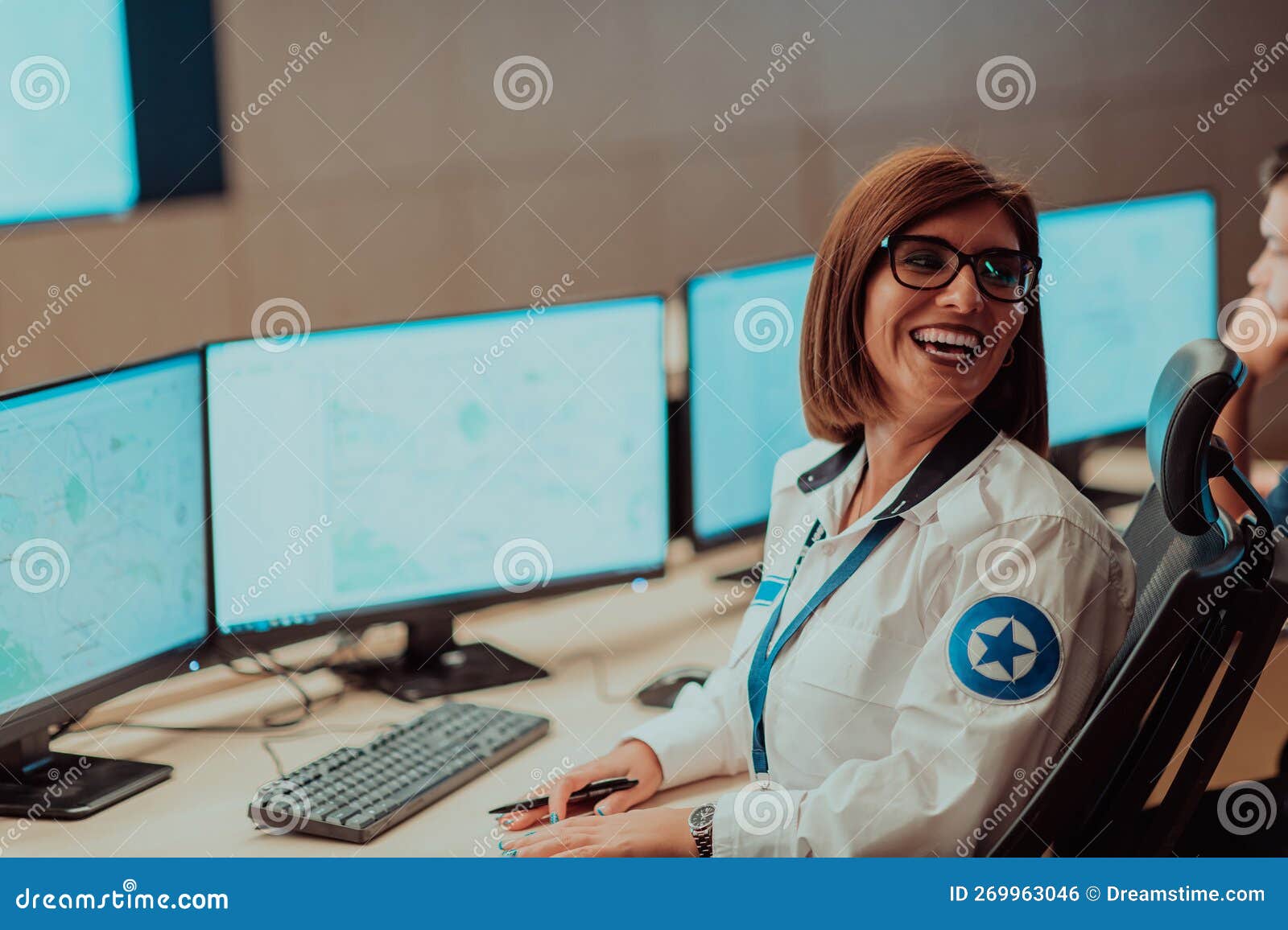 Female Security Operator Working in a Data System Control Room Offices ...