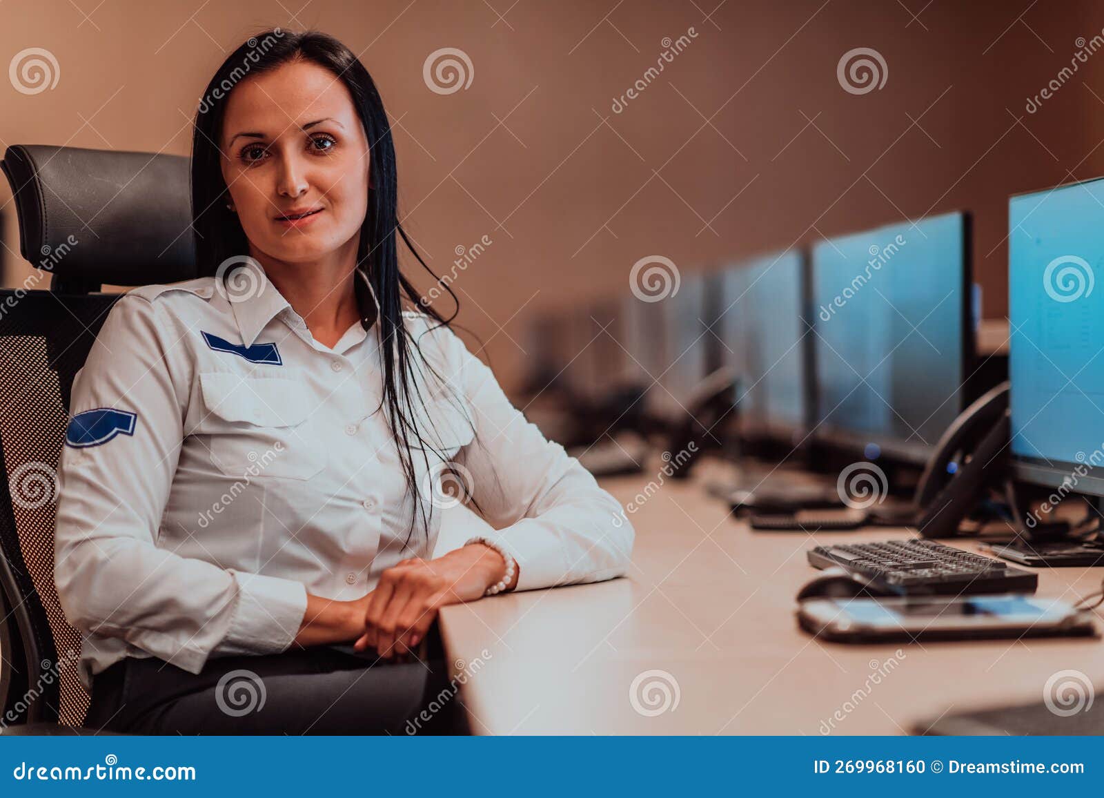 Female Security Operator Working in a Data System Control Room Offices ...