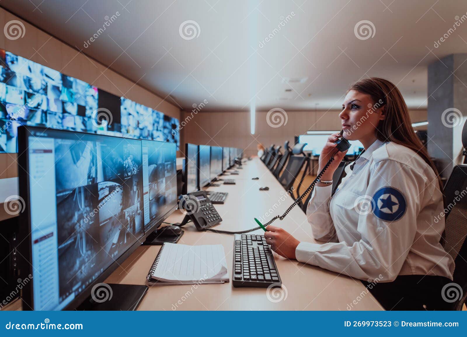 Female Security Operator Working in a Data System Control Room Offices ...
