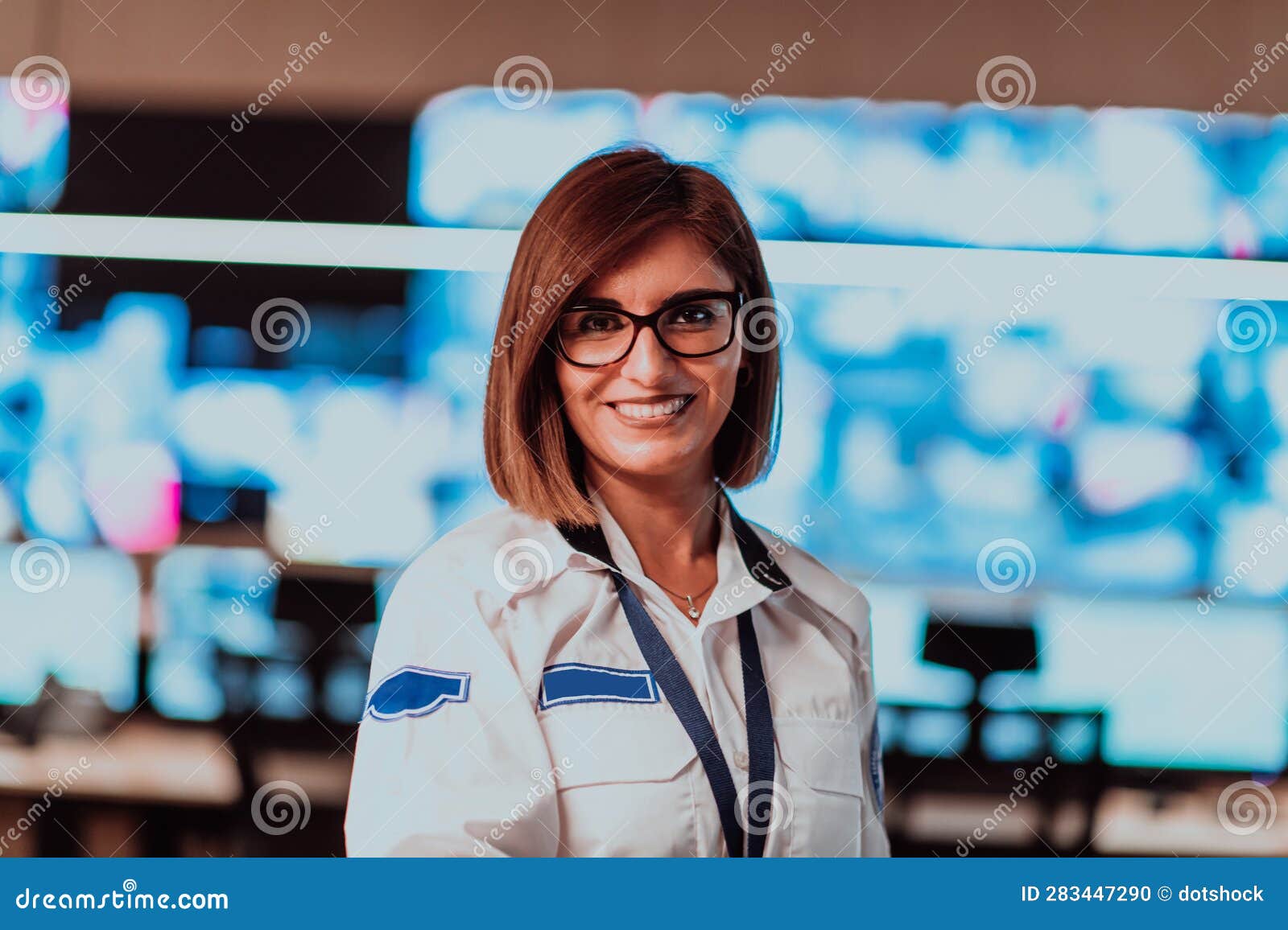 Female Security Operator Working in a Data System Control Room Offices ...