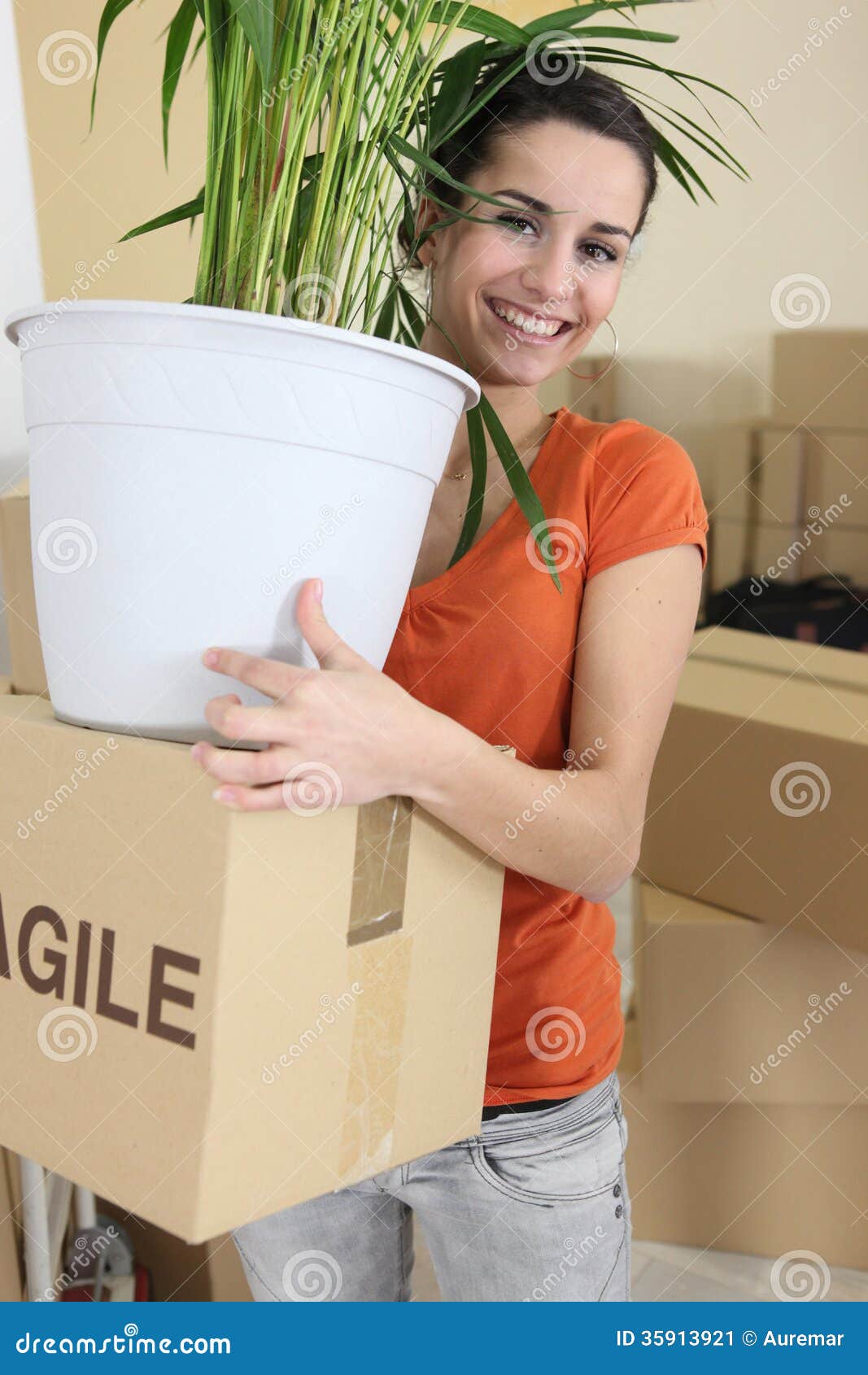 Female settling at home stock image. Image of stacked - 35913921