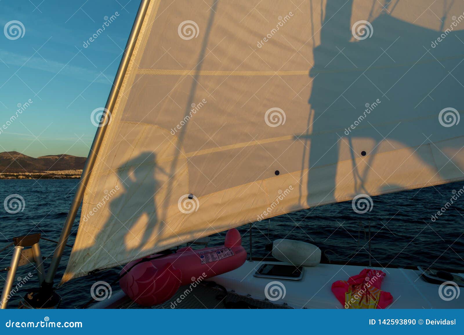 Female shadow on a sail. stock photo. Image of active - 142593890