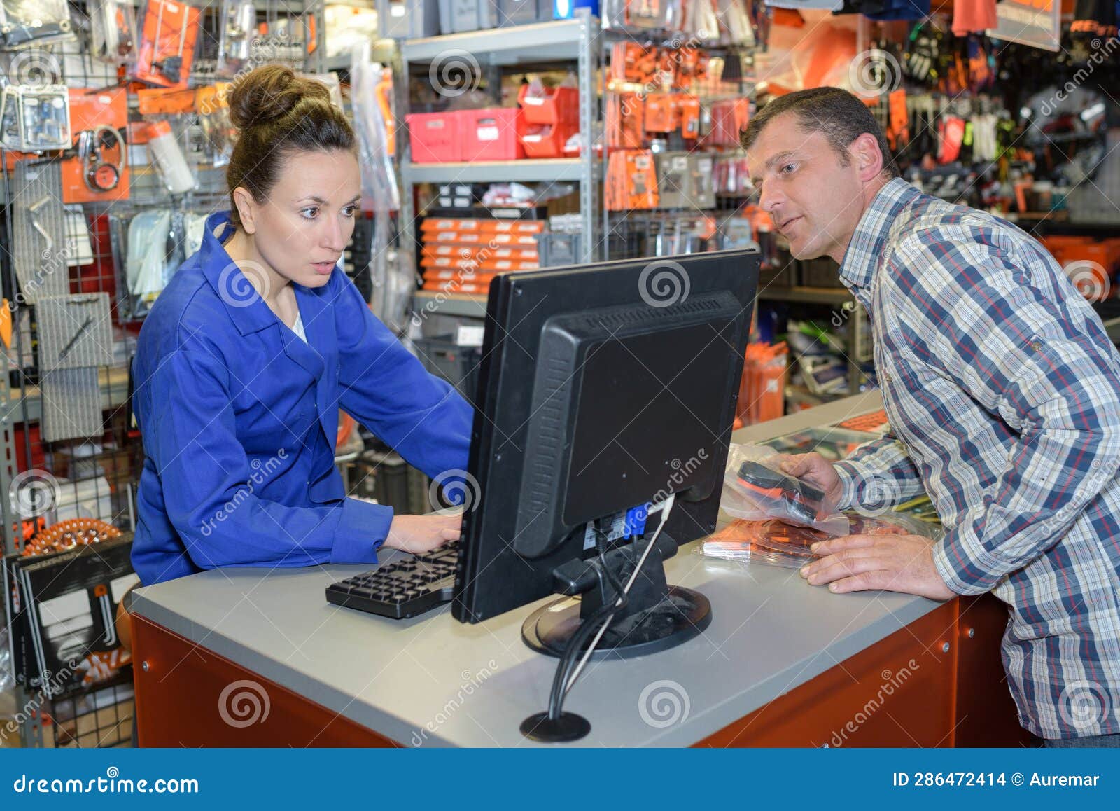 Female Shop Assistant Helping Customer Stock Photo - Image of business ...