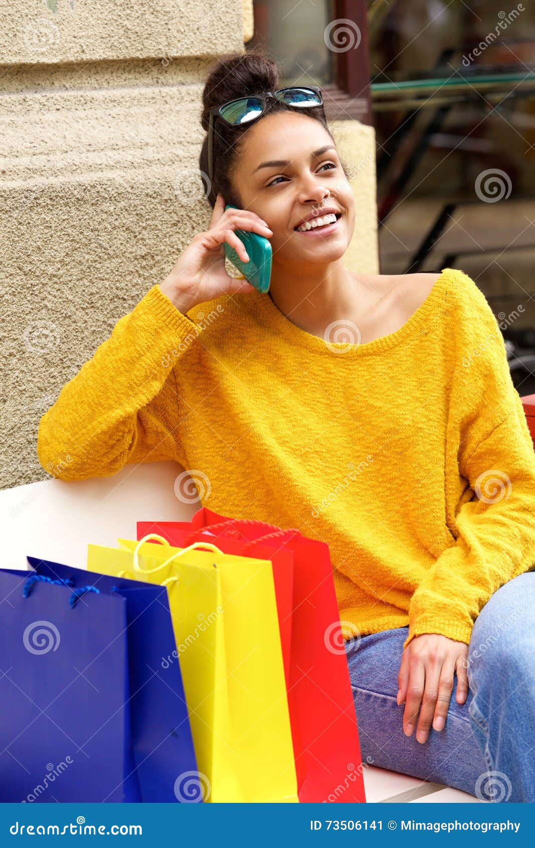 Female Shopper Using Cell Phone Stock Image - Image of casual, bench ...