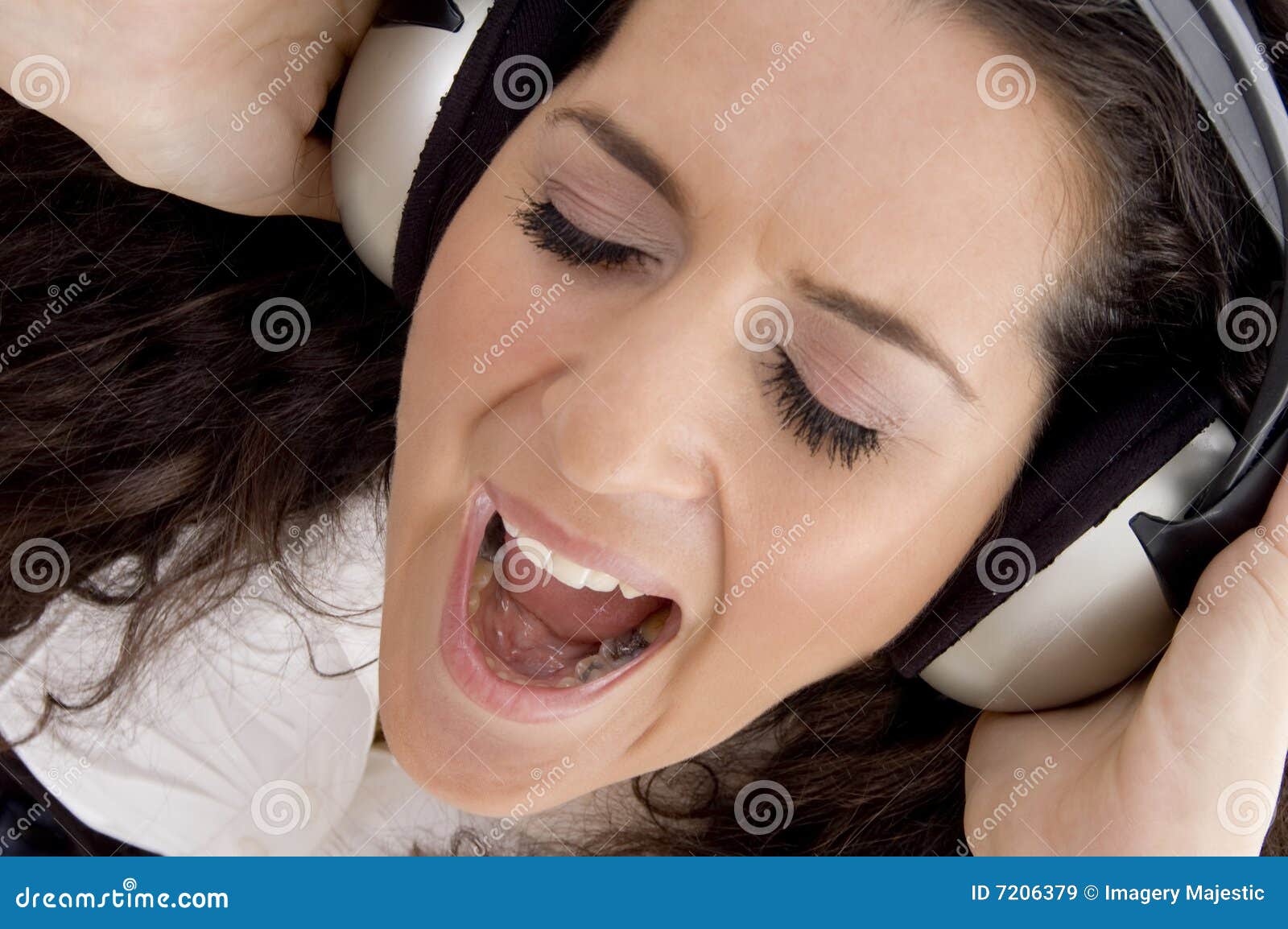 Female Shouting while Listening Music Stock Image - Image of latin ...