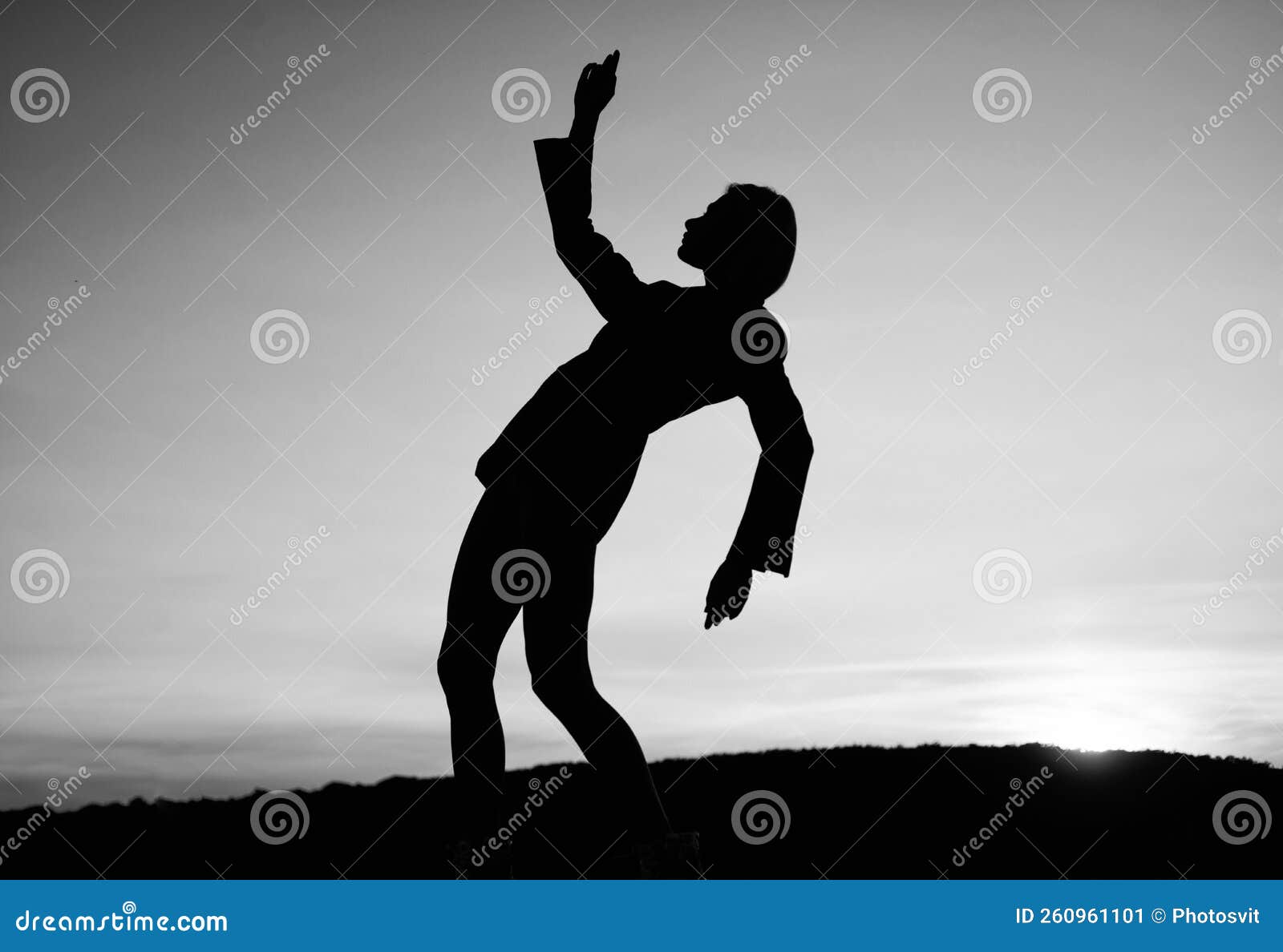 Female Silhouette On Sunset Woman Dance In Sunrise Dark Figure Of