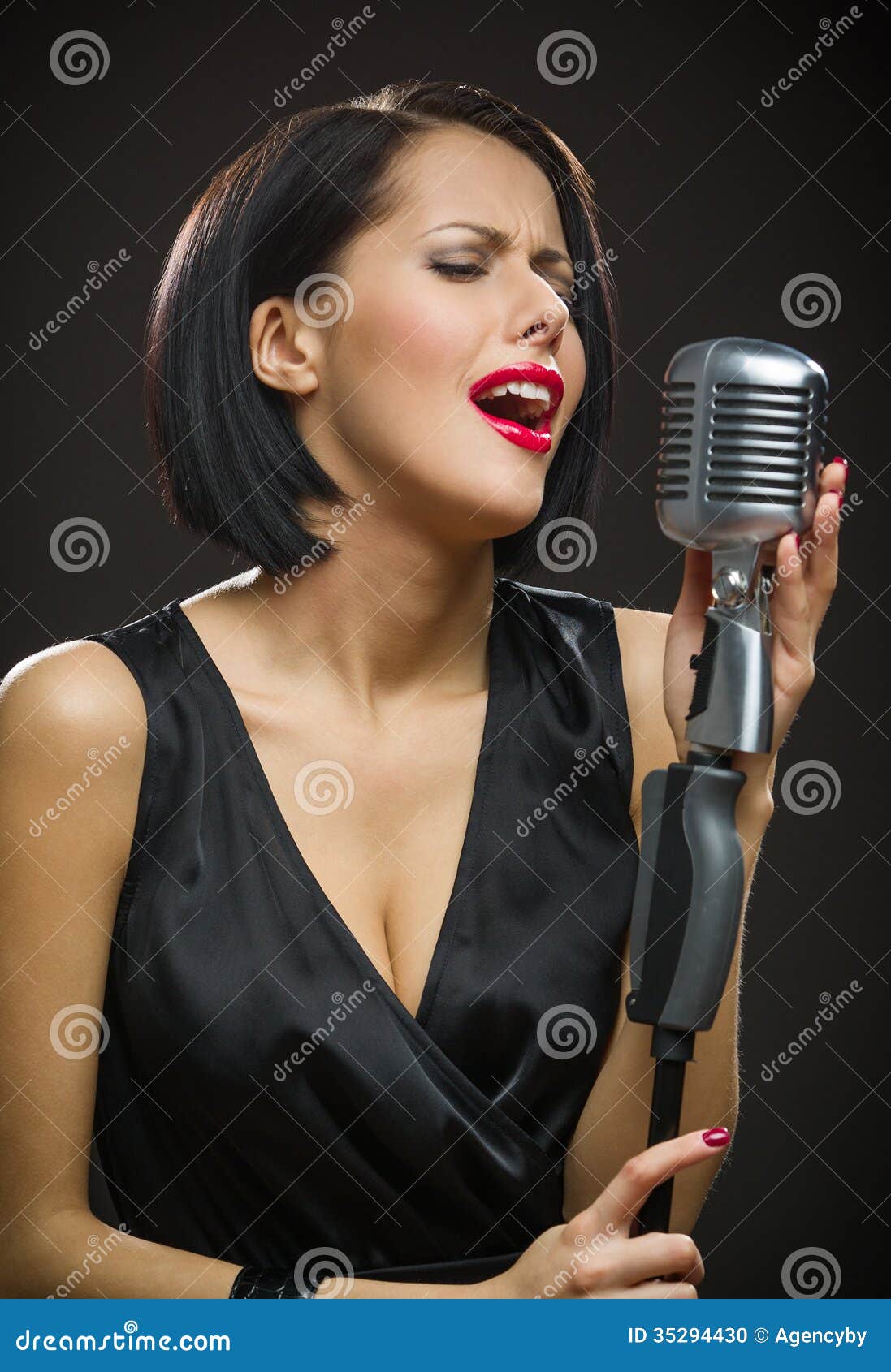 Female Musician Closed Eyes Keeping Mike Stock Photos - Free & Royalty ...