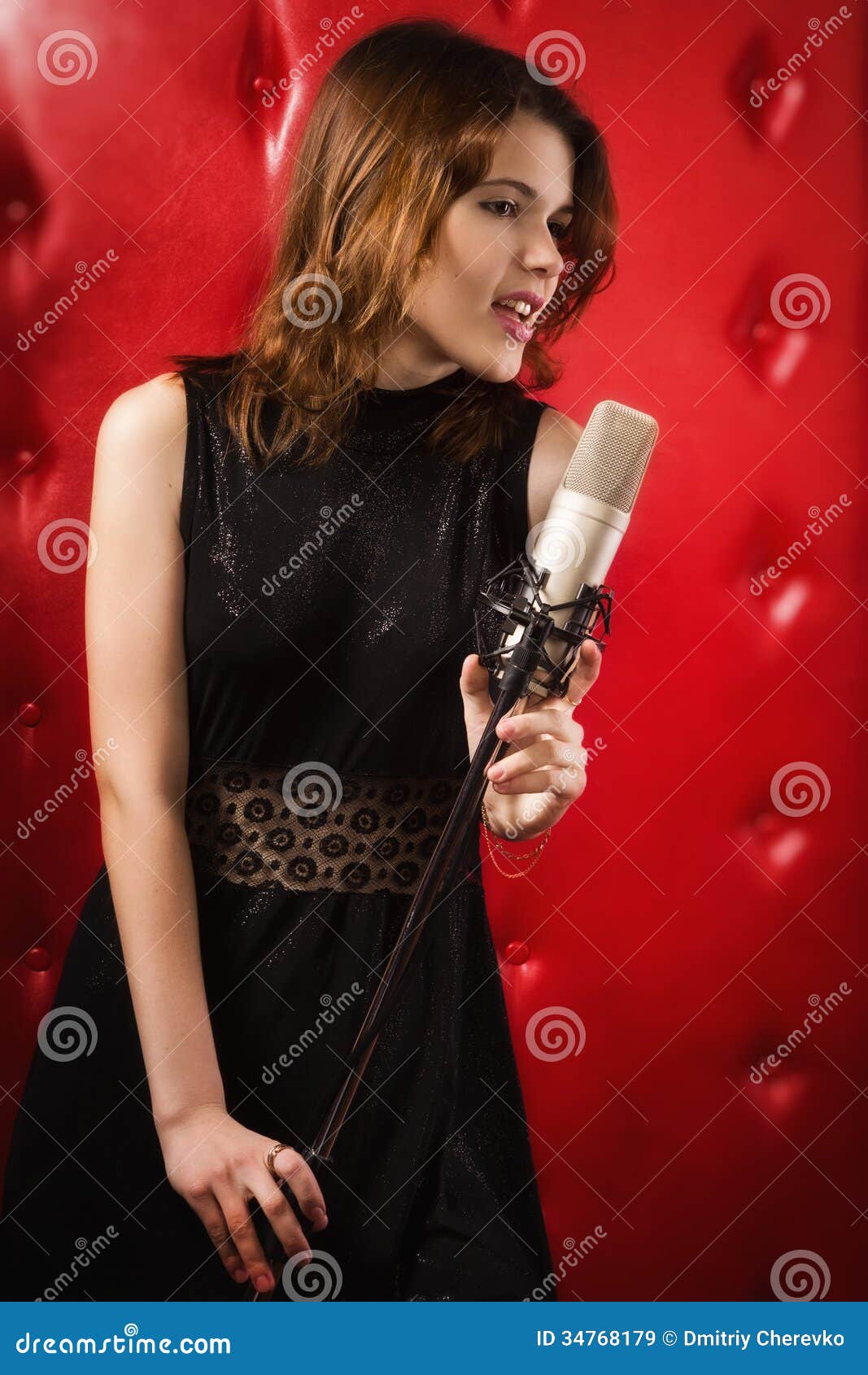 Female Singer with Microphone Stock Image - Image of performer, pose ...