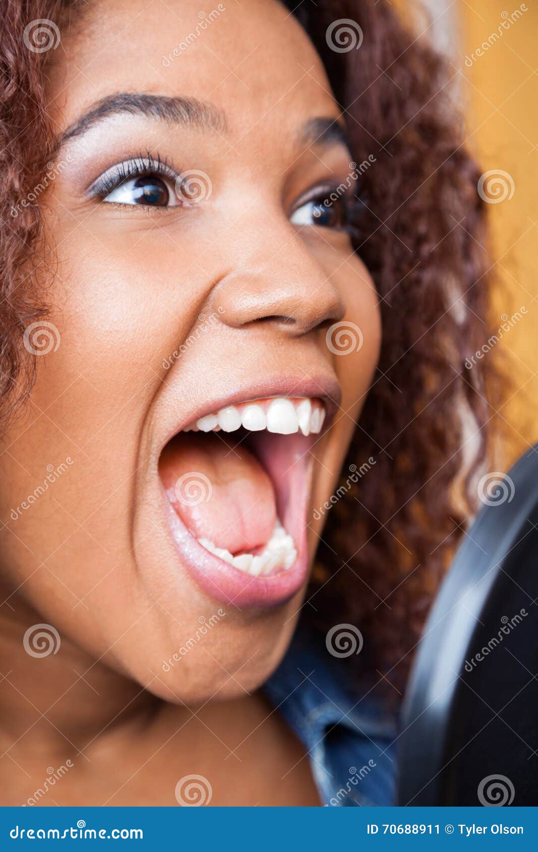 Female Singer with Mouth Open Performing in Recording Studio Stock ...