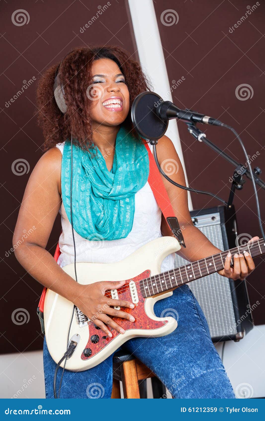 Female Singer Playing Guitar In Recording Studio Stock Photo - Image ...