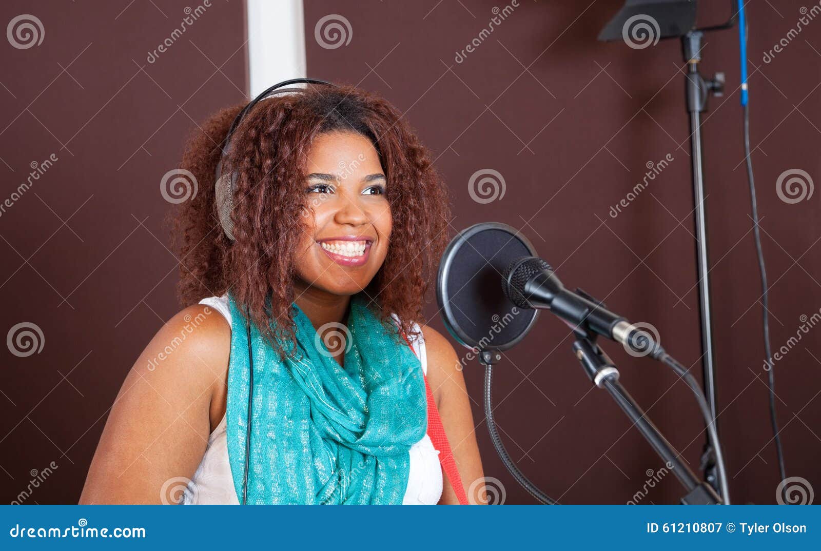 Female Singer Smiling while Performing in Studio Stock Image - Image of ...
