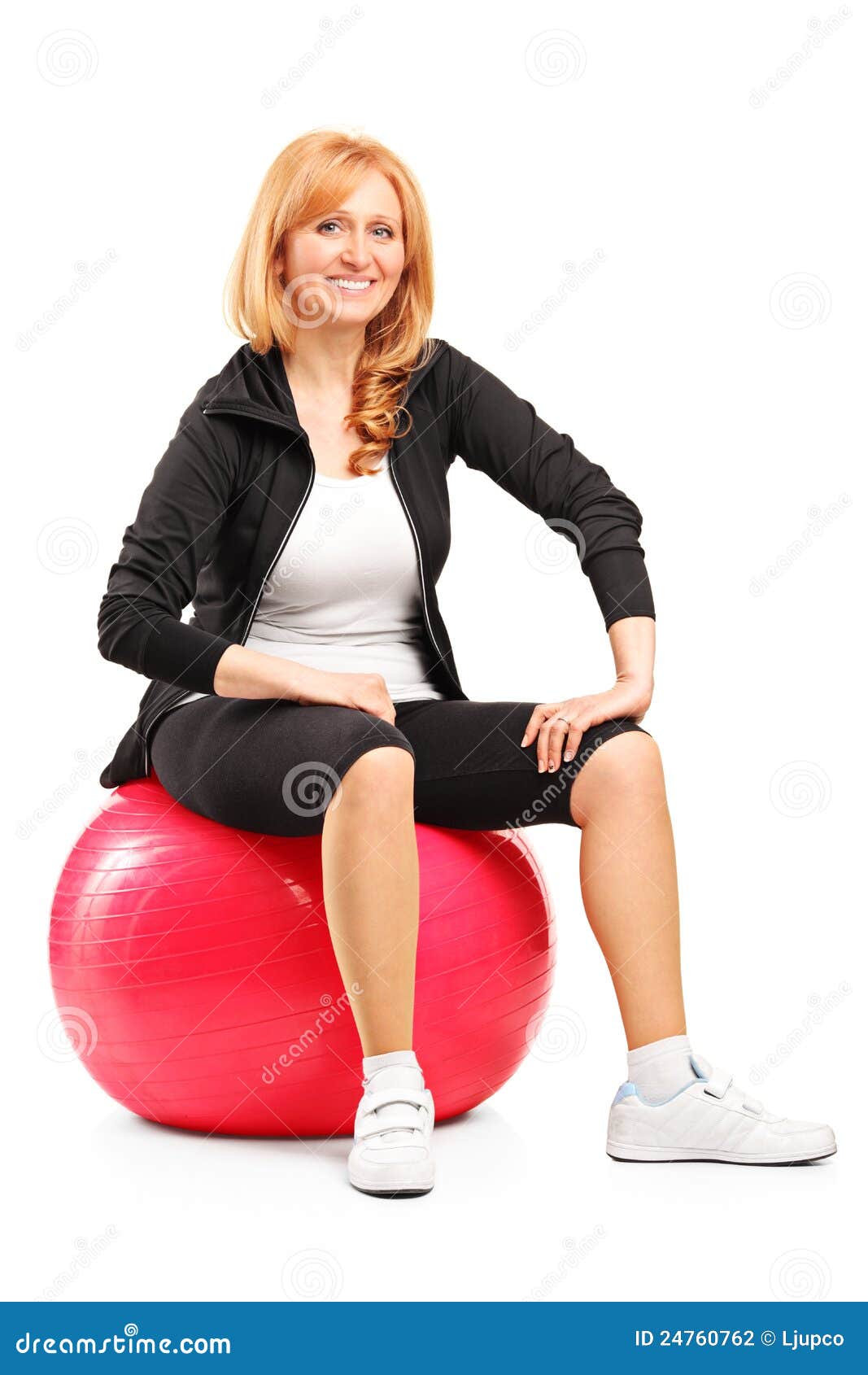 Female Sitting on a Pilates Ball Stock Photo - Image of mature ...