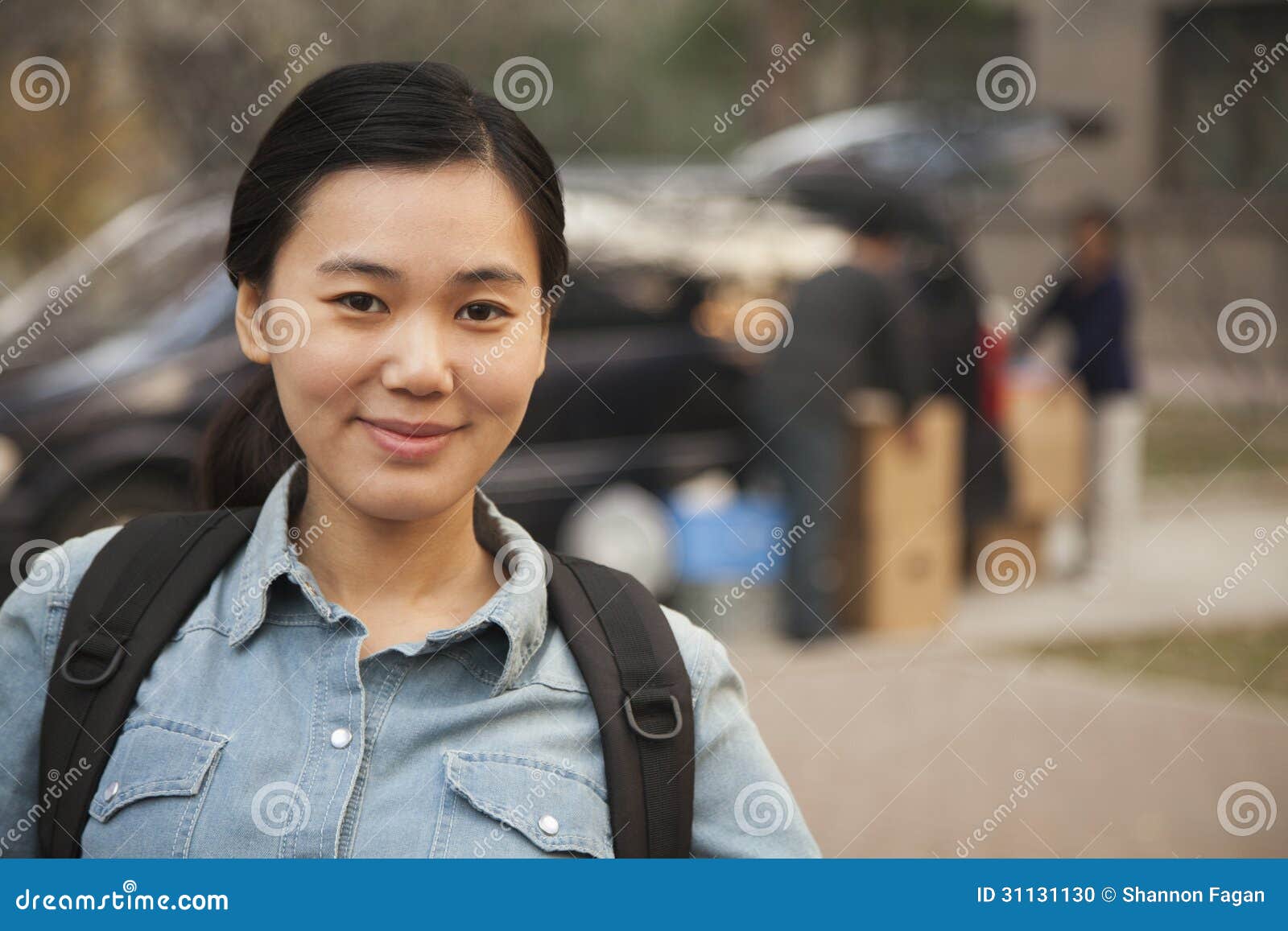 Female Smiling Student Portrait in Front of Dormitory at College Stock ... Female Smiling Student Portrait in Front of Dormitory at College Stock ...