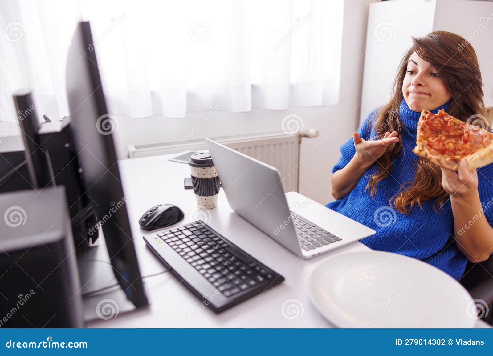 Female Software Developer Taking Lunch Break while Working Remotely ...