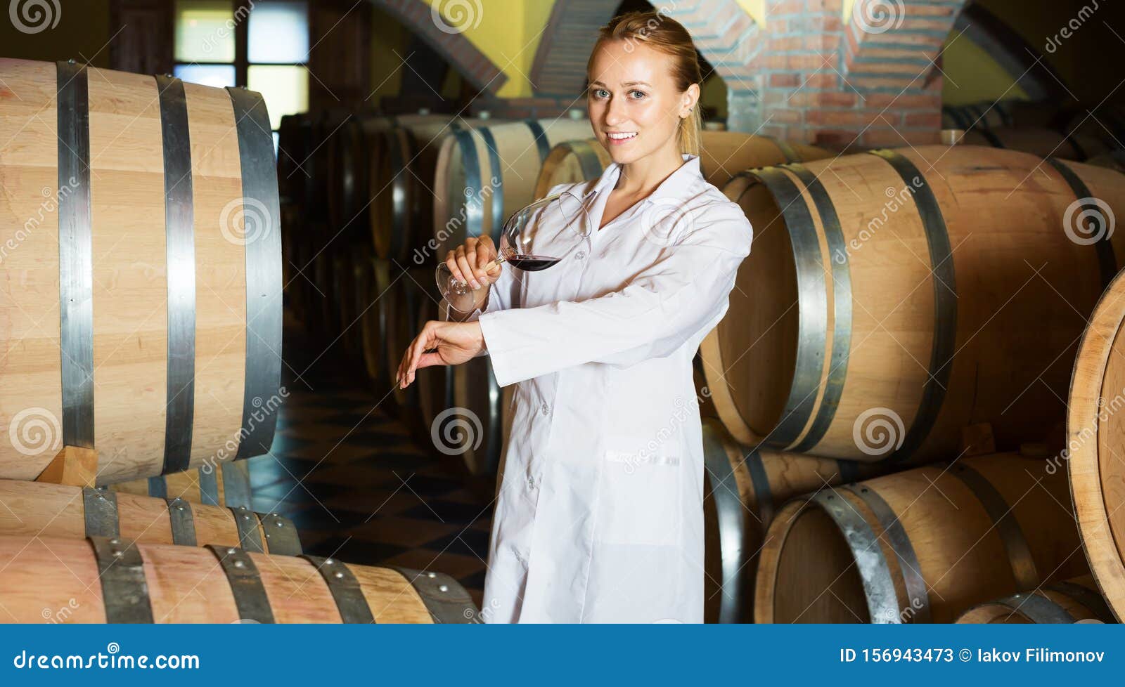 Female Sommelier in Wine Cellar Stock Image - Image of people, maker ...