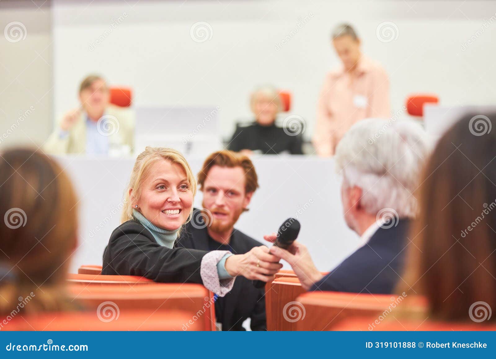 Female Speaker Asking Audience in Business Event at Auditorium Stock ... Female Speaker Asking Audience in Business Event at Auditorium Stock ...