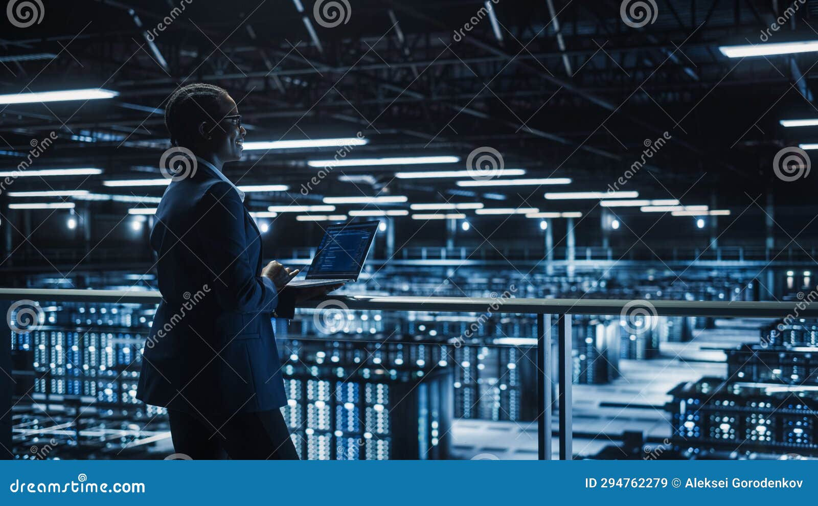 Female it Specialist Using Laptop Computer in Data Center, Walking on a ...