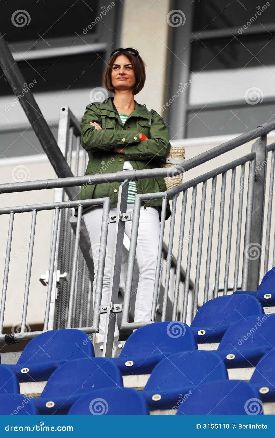 Female Spectator at Race Track Stock Photo - Image of preoccupied ...