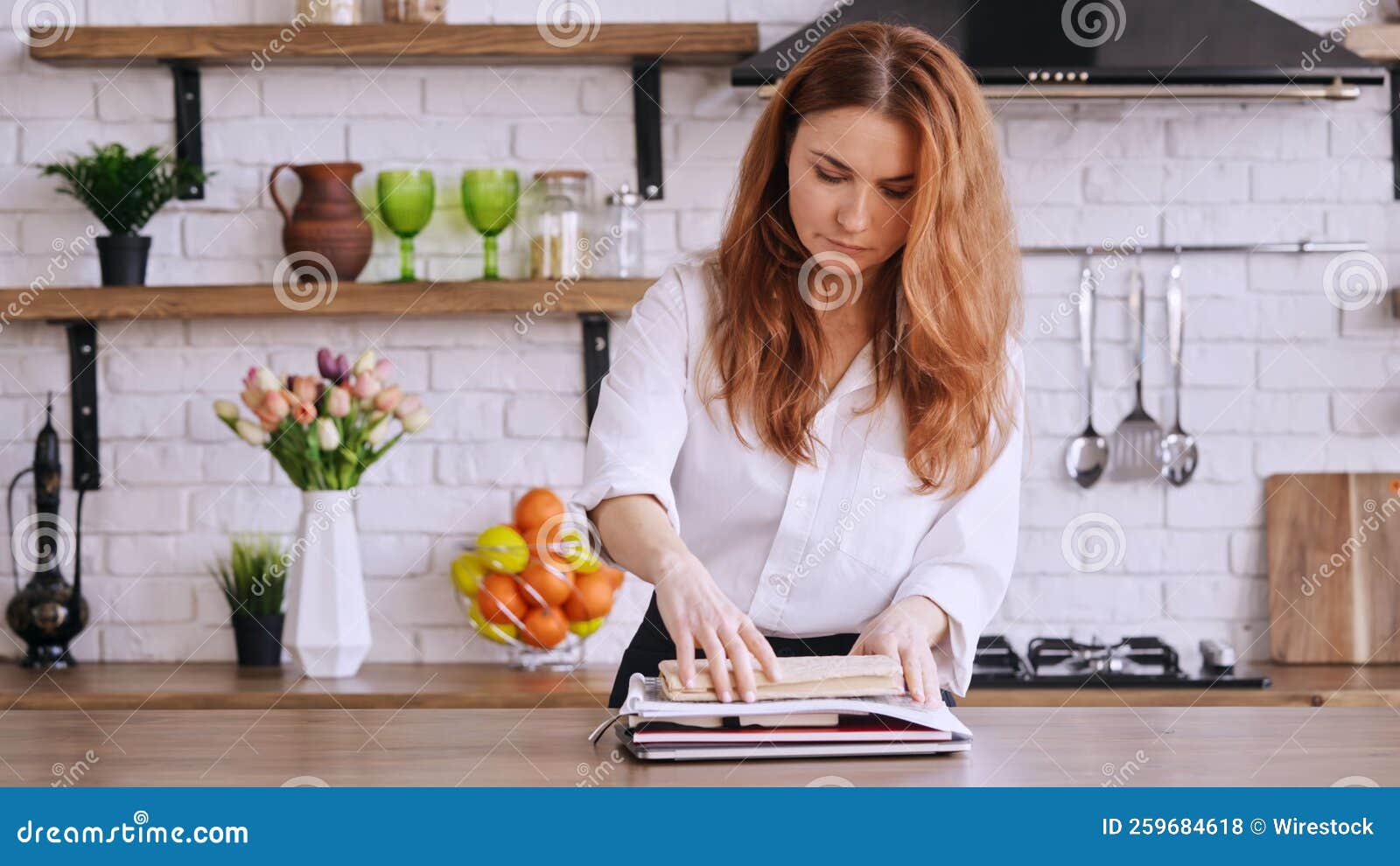 Female Stacking Some Documents in Her Kitchen Stock Photo - Image of ...