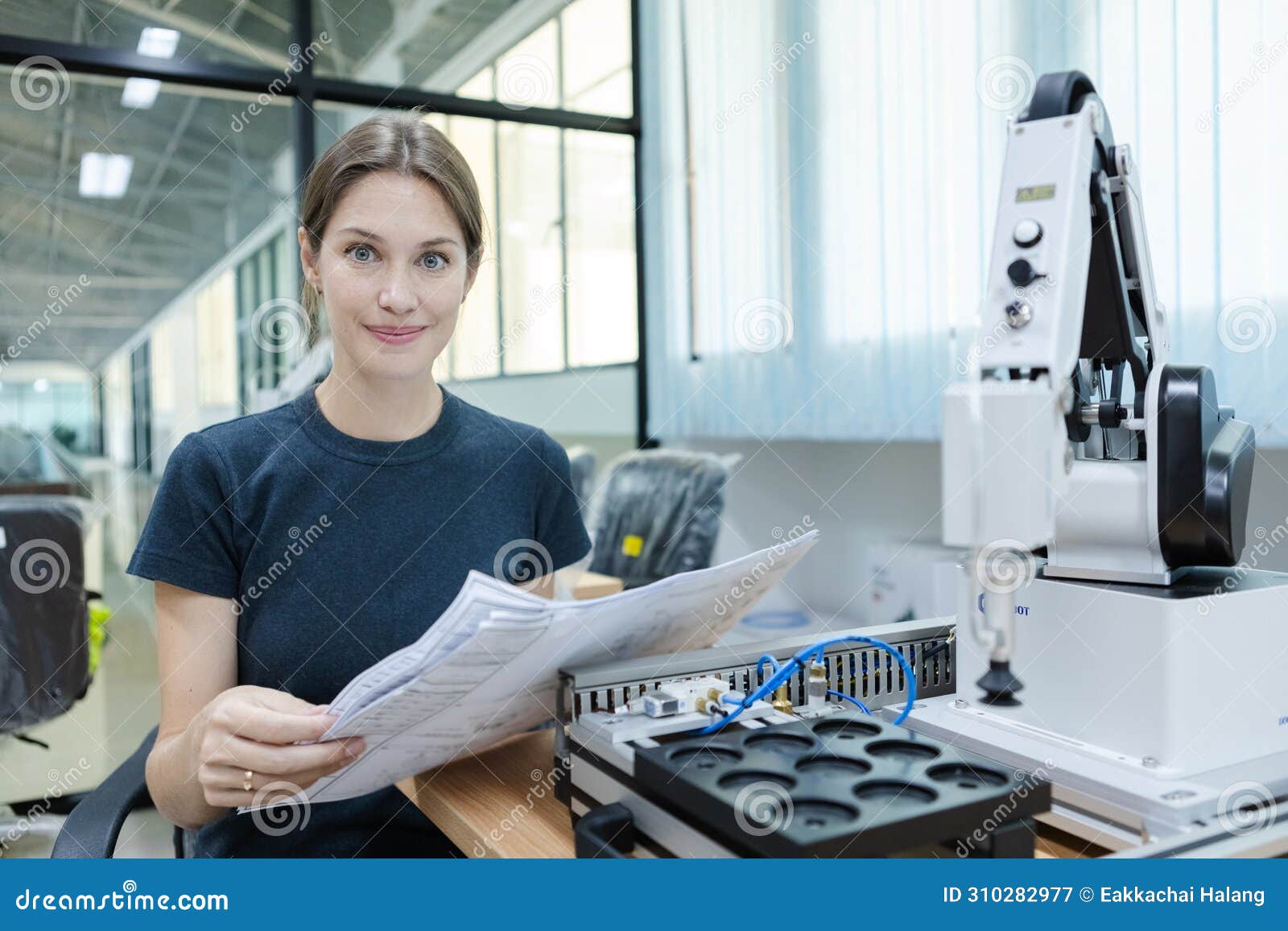 Female Staff Engineer Working System Robot. Education Classroom for Future Robotics Learning ...