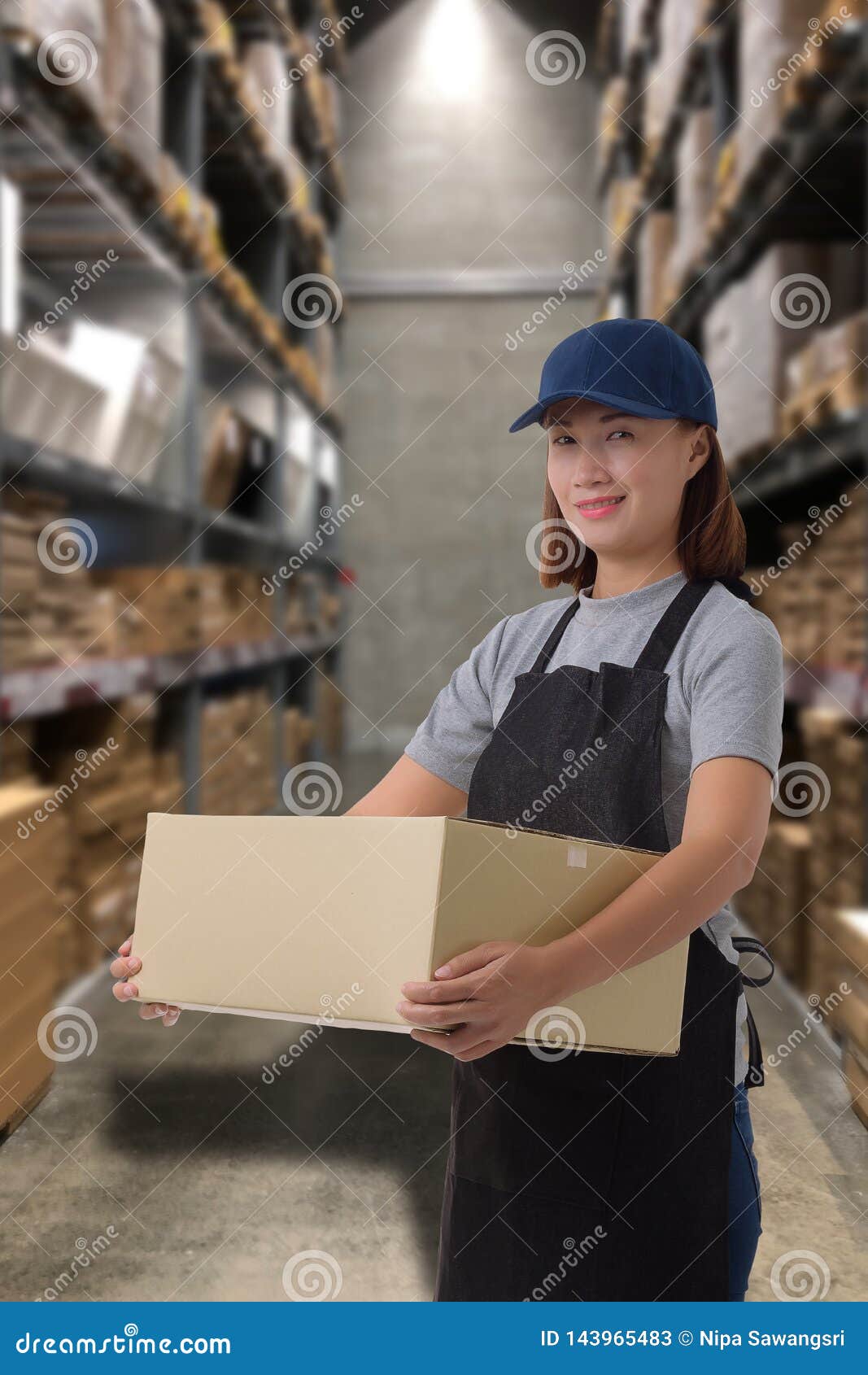 Female Staff Lifting Parcel Boxes in the Warehouse Stock Image - Image ...