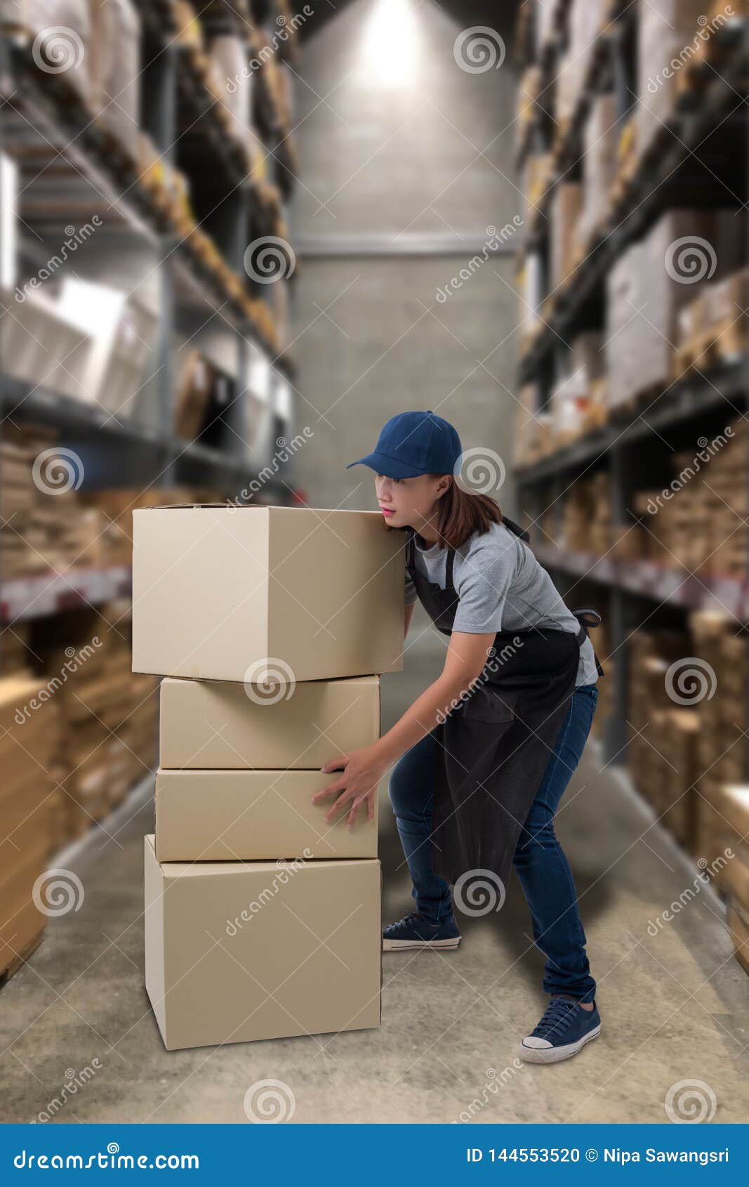 Female Staff Lifting Parcel Boxes in the Warehouse Stock Photo - Image ...