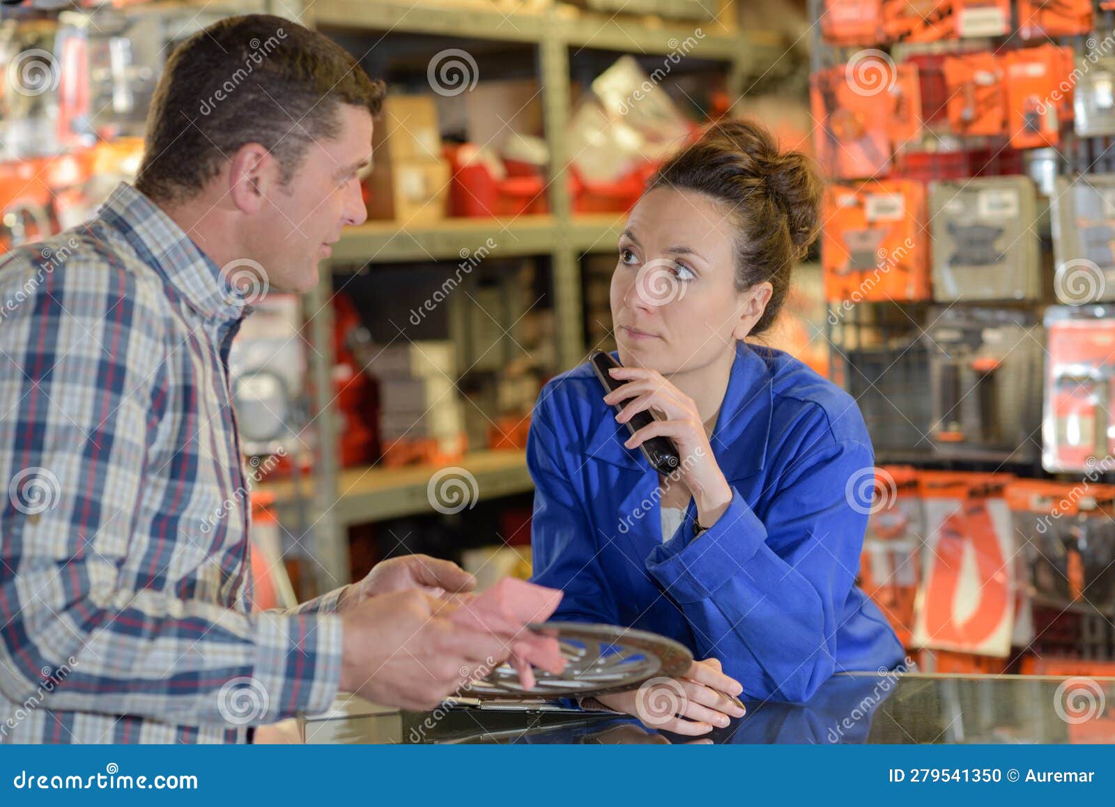 Female Store Assistant with Customer Stock Photo - Image of selling ...
